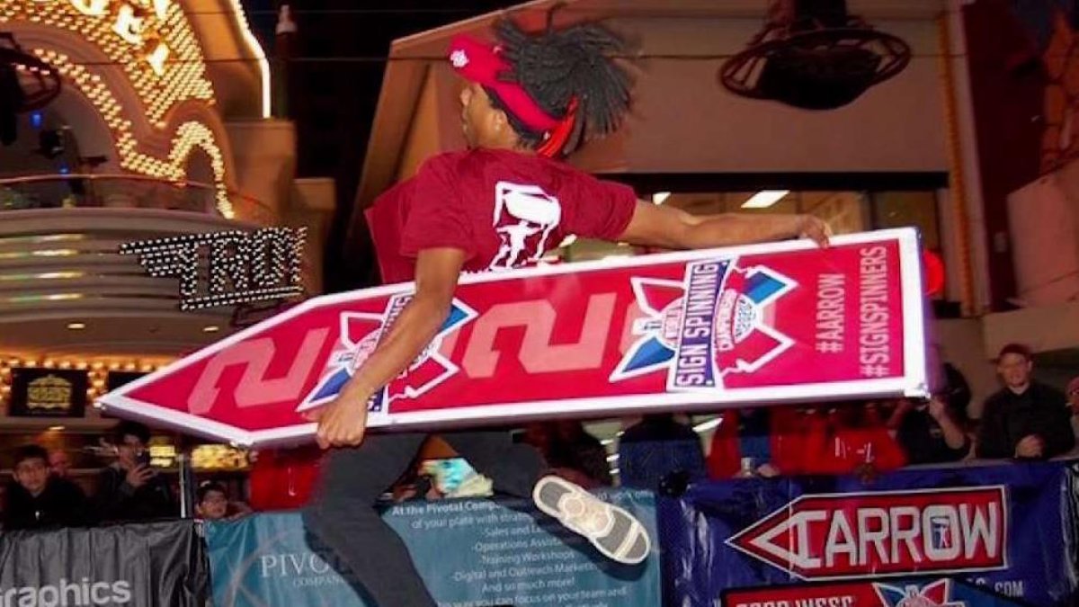 World Champ Sign Spinner Shows Moves From the ‘Tricktionary’ – NBC4 ...