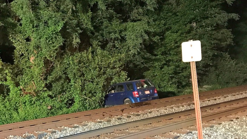 1 Injured After Car Gets Stuck on Railroad Track – NBC4 Washington