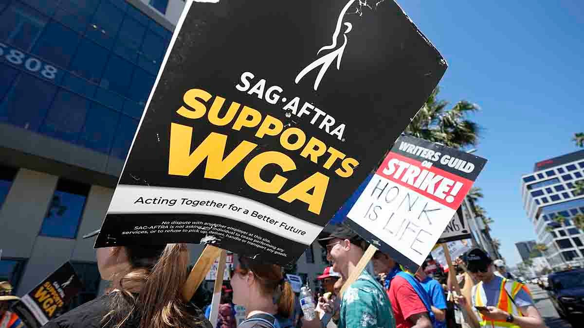 Hollywood actors join screenwriters in historic industry-stopping ...