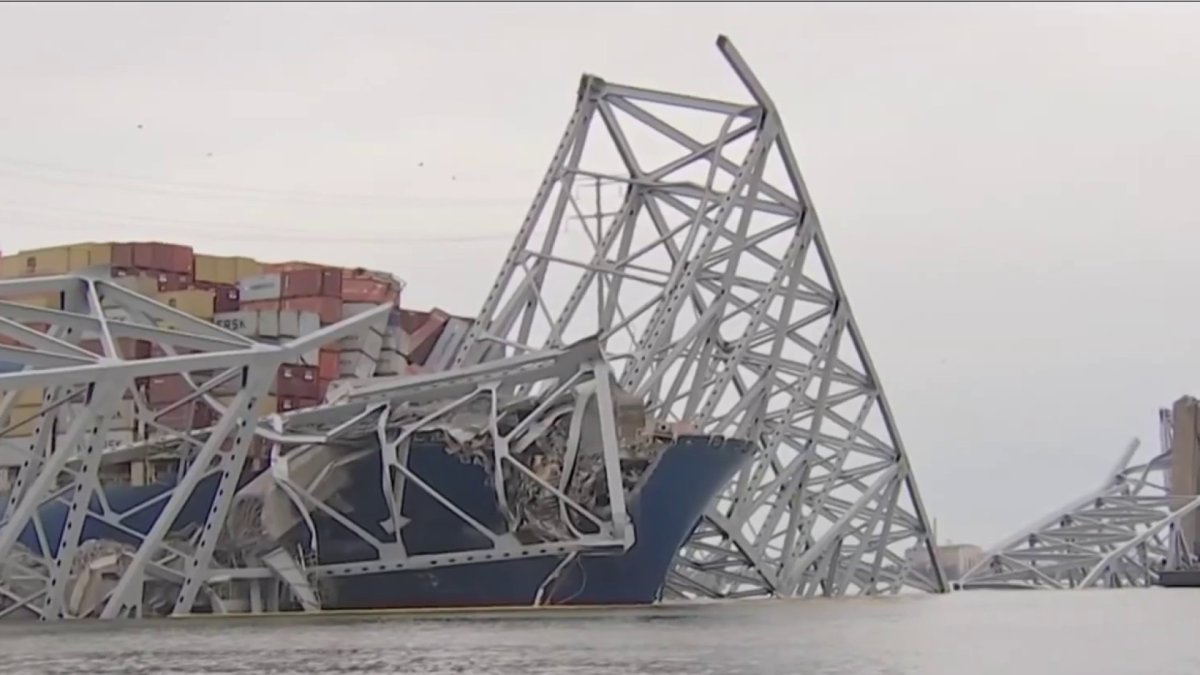 Coast Guard crews begin to clear wreckage of Key Bridge after collapse ...