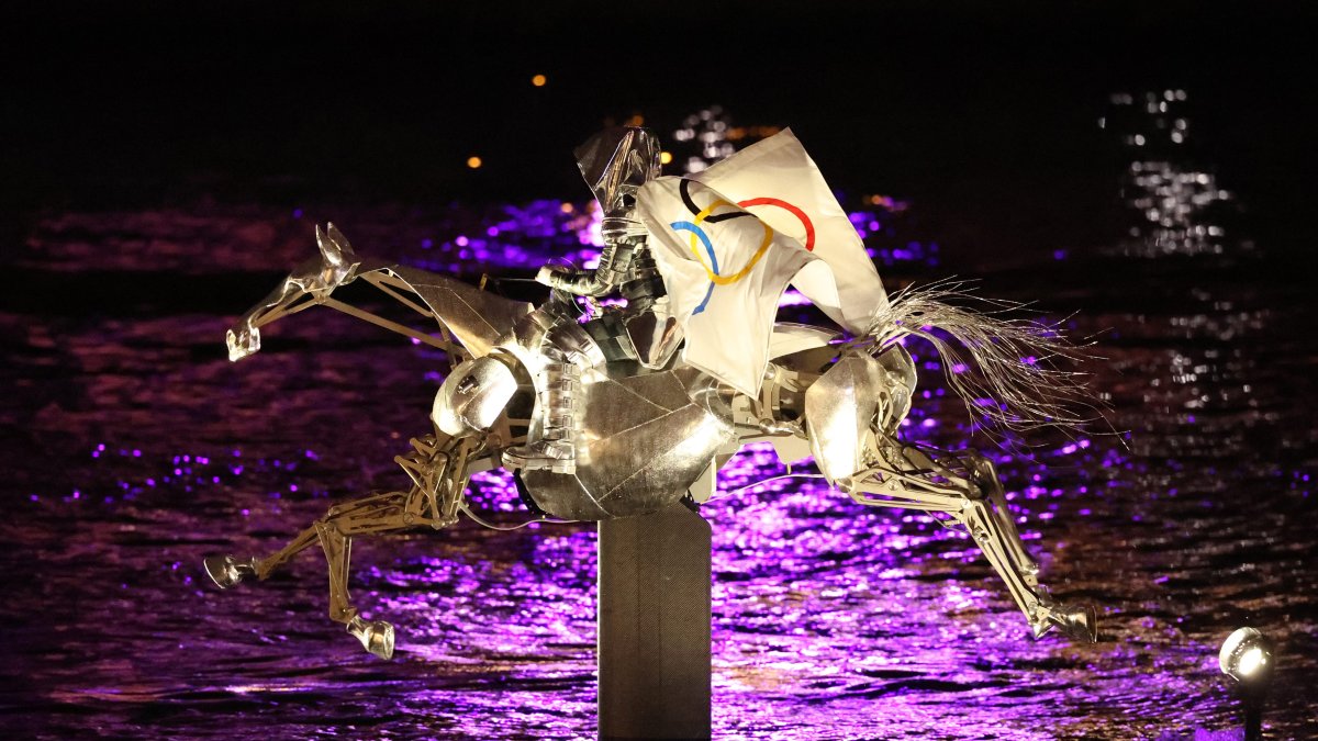 Live updates: 2024 Olympics Opening Ceremony ends with cauldron ...