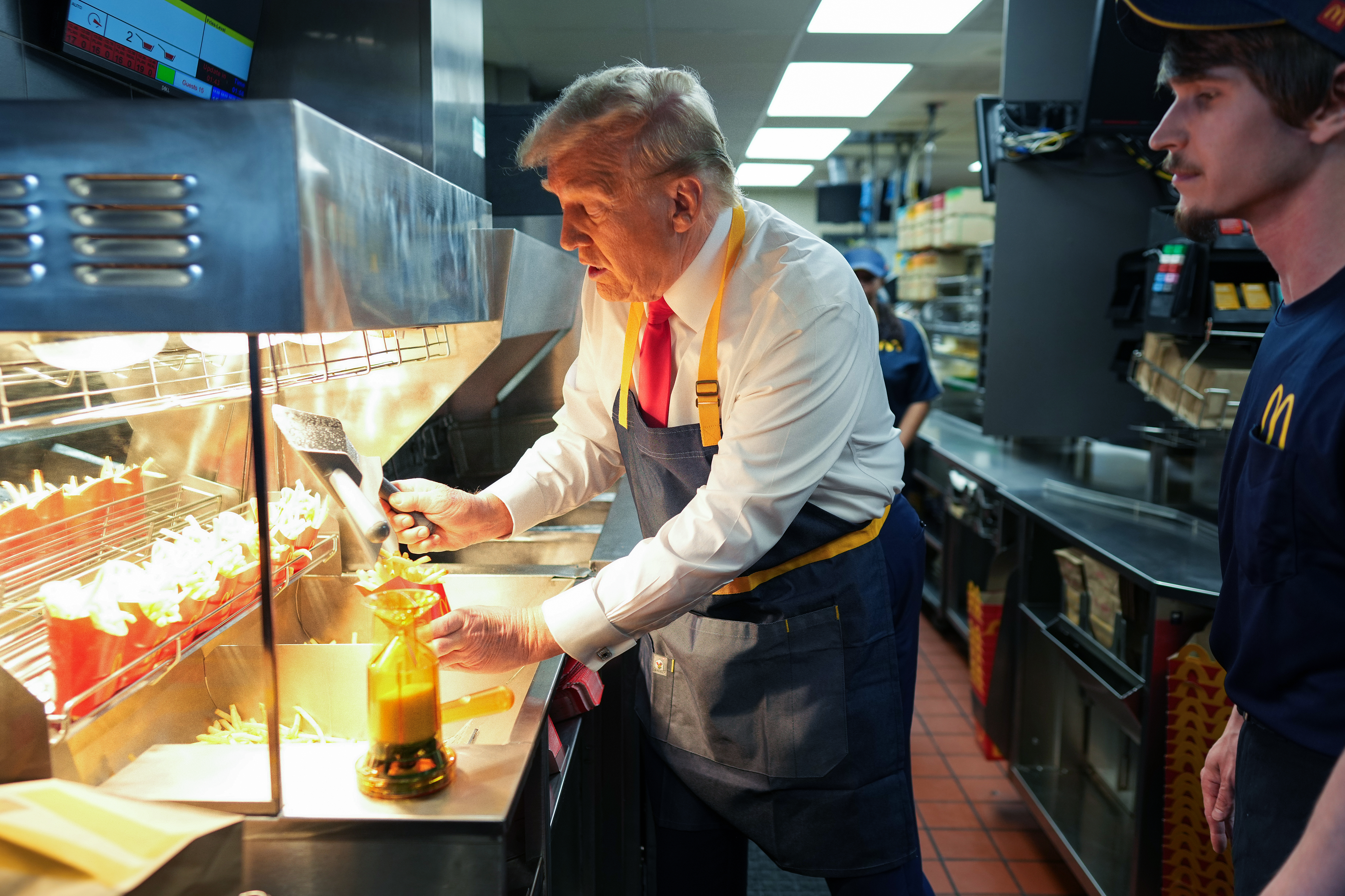 Trump attempts to troll Harris by serving french fries at a ...