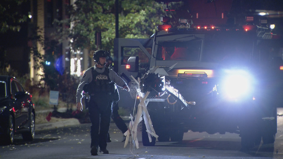 Police arrest man charged with threatening and shooting neighbor in the neck after standoff ...