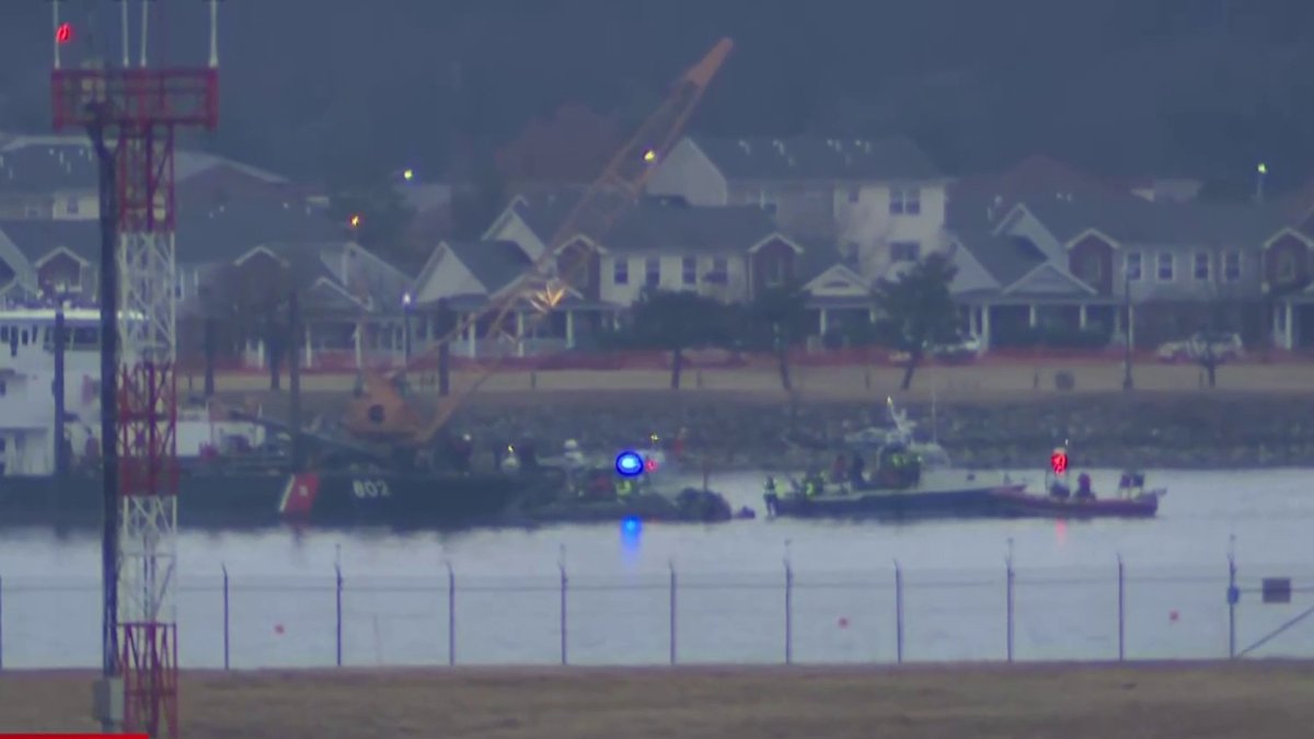 Crane brought to crashed Black Hawk helicopter as debris field migrates ...