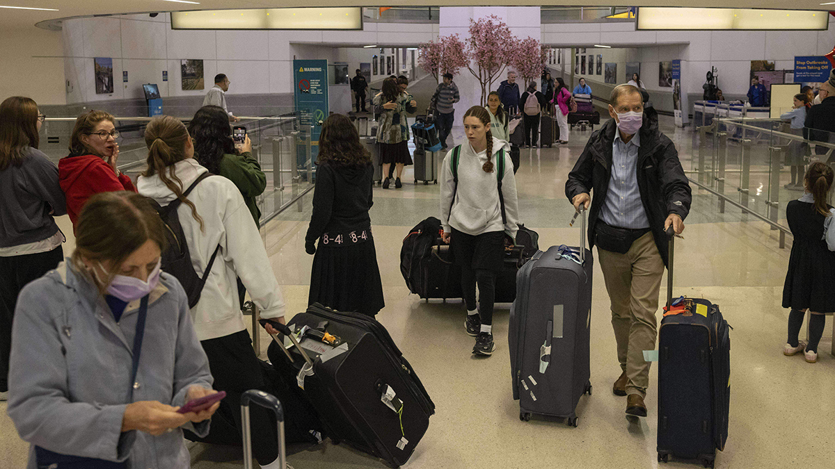 Trump’s new travel ban takes effect as tensions escalate over ...