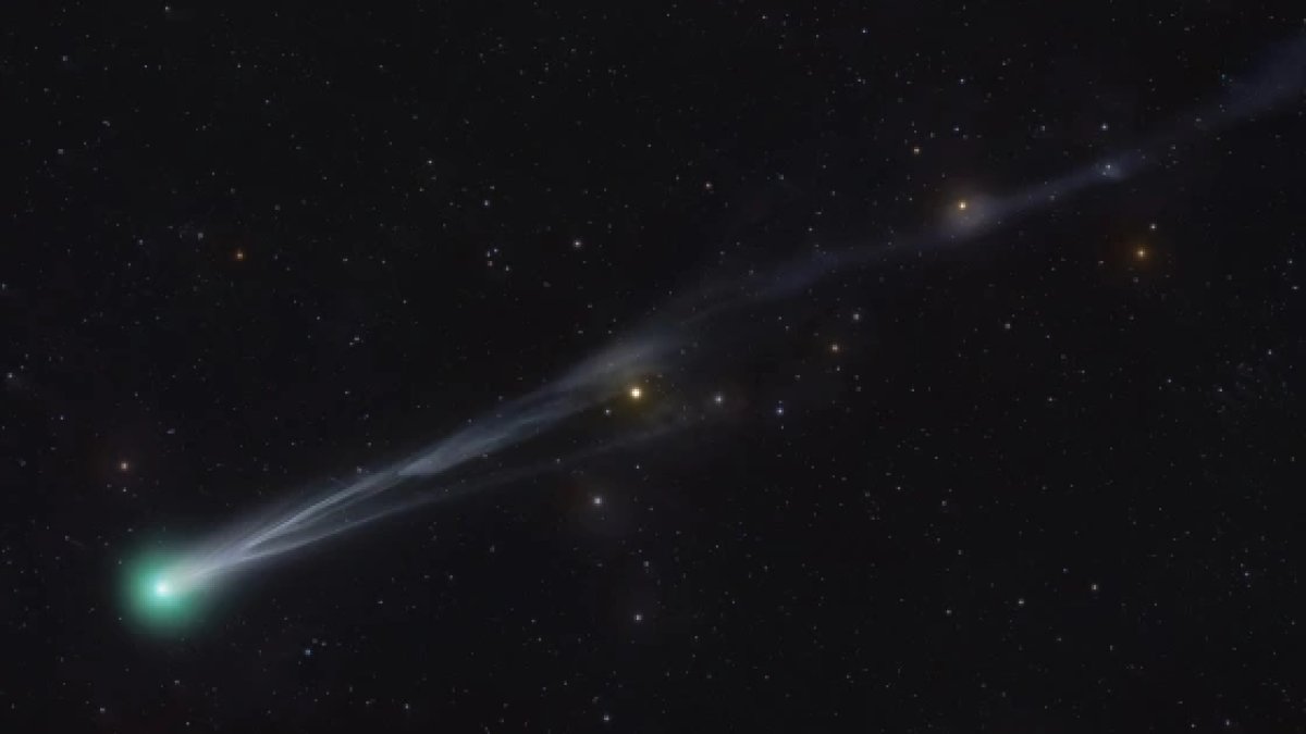 Two greenish comets are streaking across the night sky this month ...